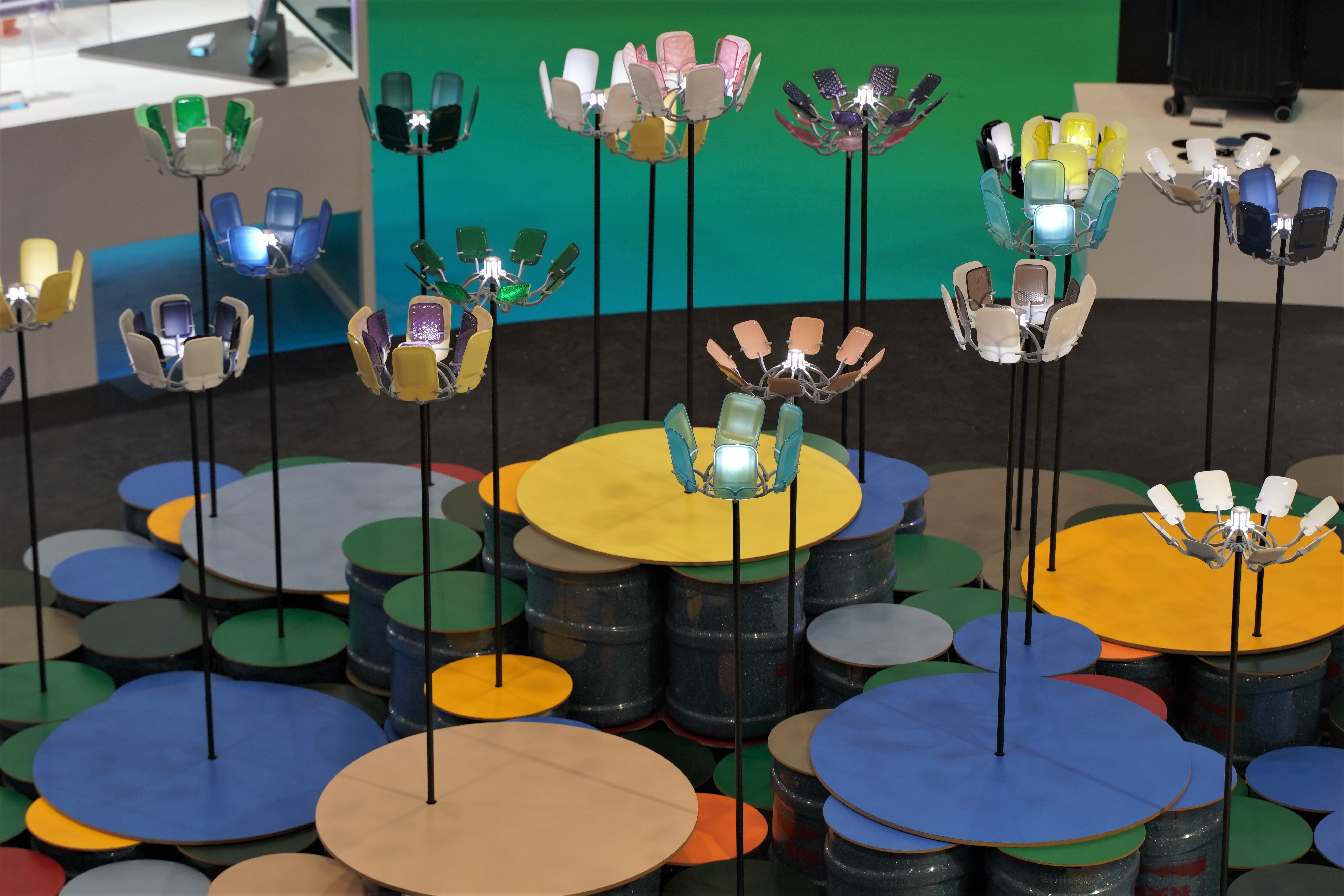 Marking a Colorful Garden Art Installation out of Recycled Bottles ...